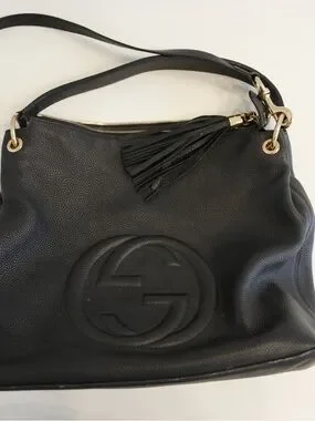 Gucci | Bags | Gucci Black Pebbled Leather Shoulder Bag With Tassel ...